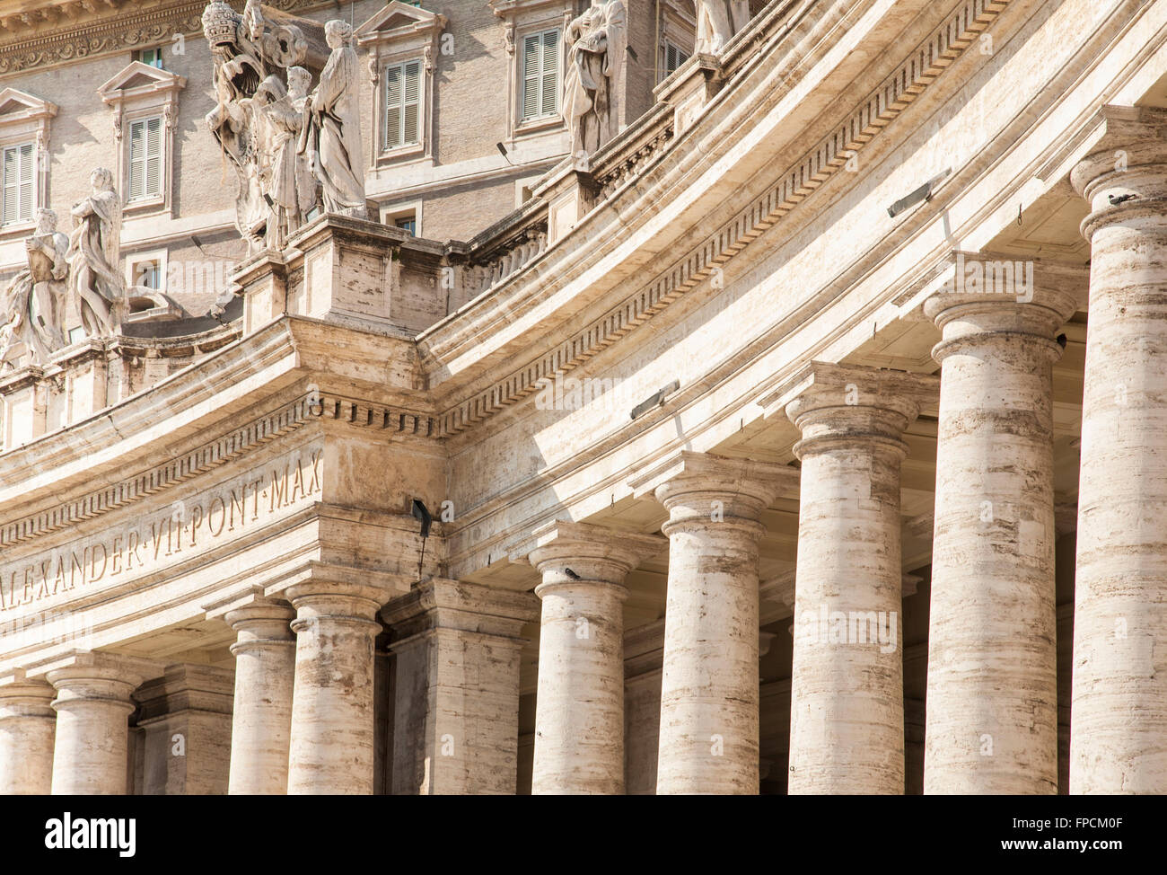 A view of the Vatican in Rome, focusing on the pillars on the building ...