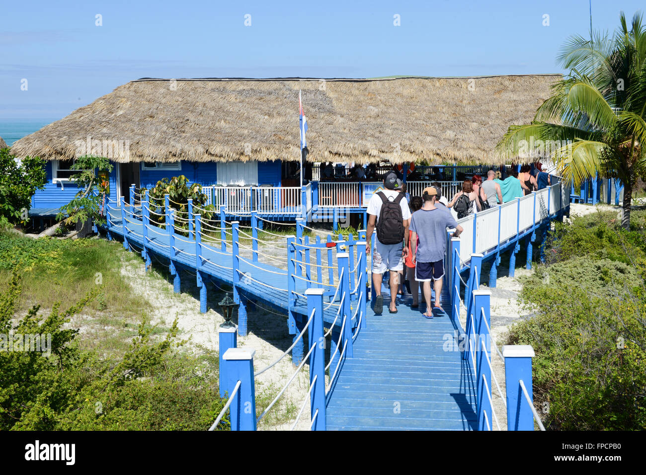 Cayo Guillermo, Cuba - 16 january 2016: people walking on a bridge to ...