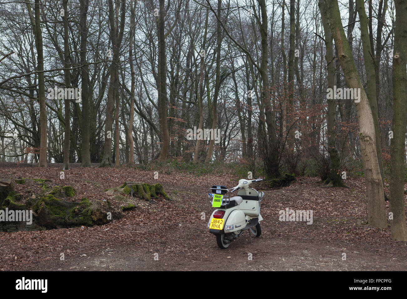 Stolen moped left in the woods wityh police aware notice on the back ...