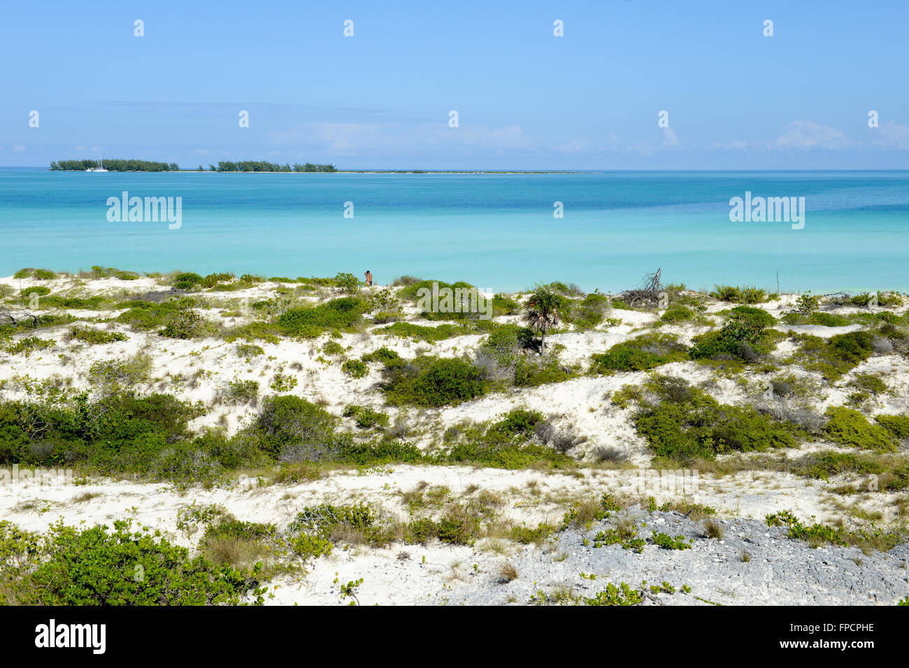 Cayo Guillermo, Cuba - 16 january 2016: people walking in clear water ...