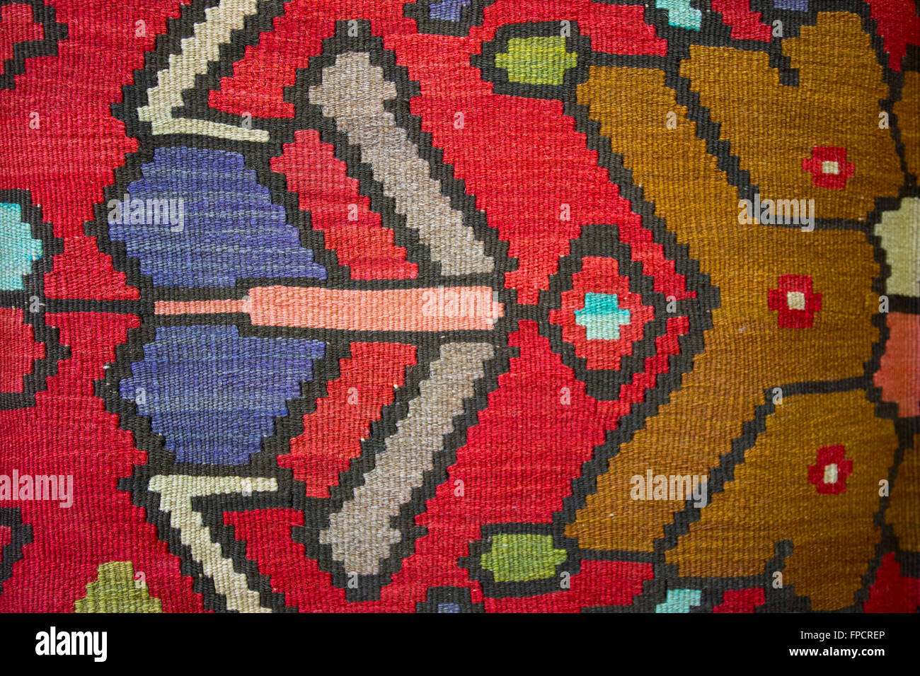 Armenian colorful hand made rug with traditional patterns and ornaments ...