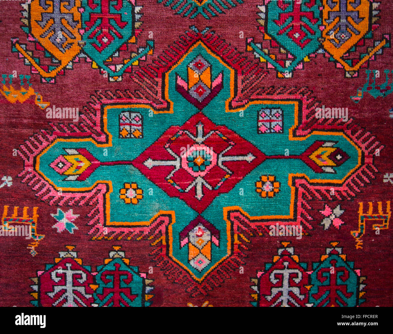 Armenian colorful hand made rug with traditional patterns and ornaments ...
