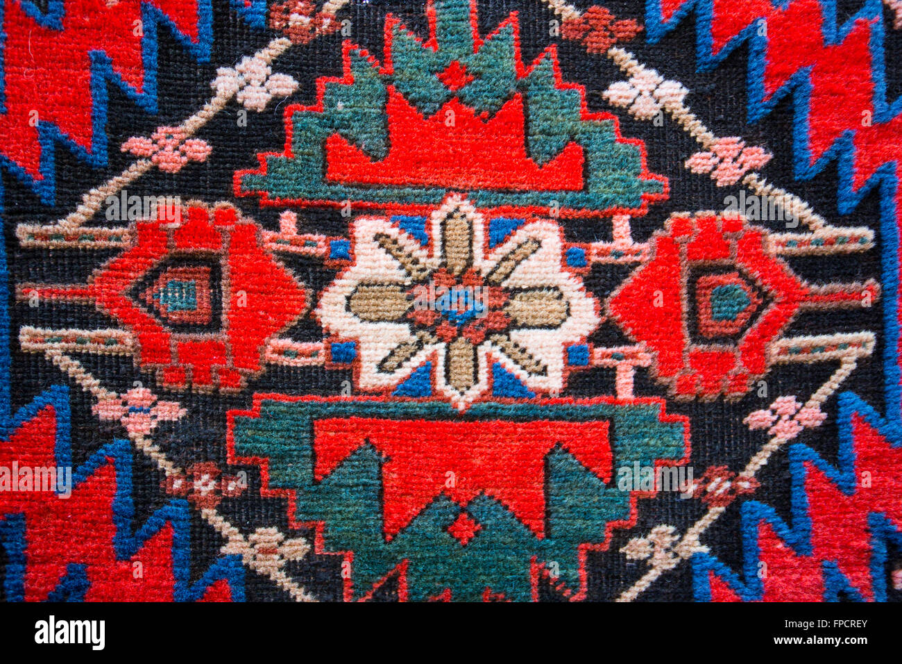 Armenian colorful hand made rug with traditional patterns and ornaments ...