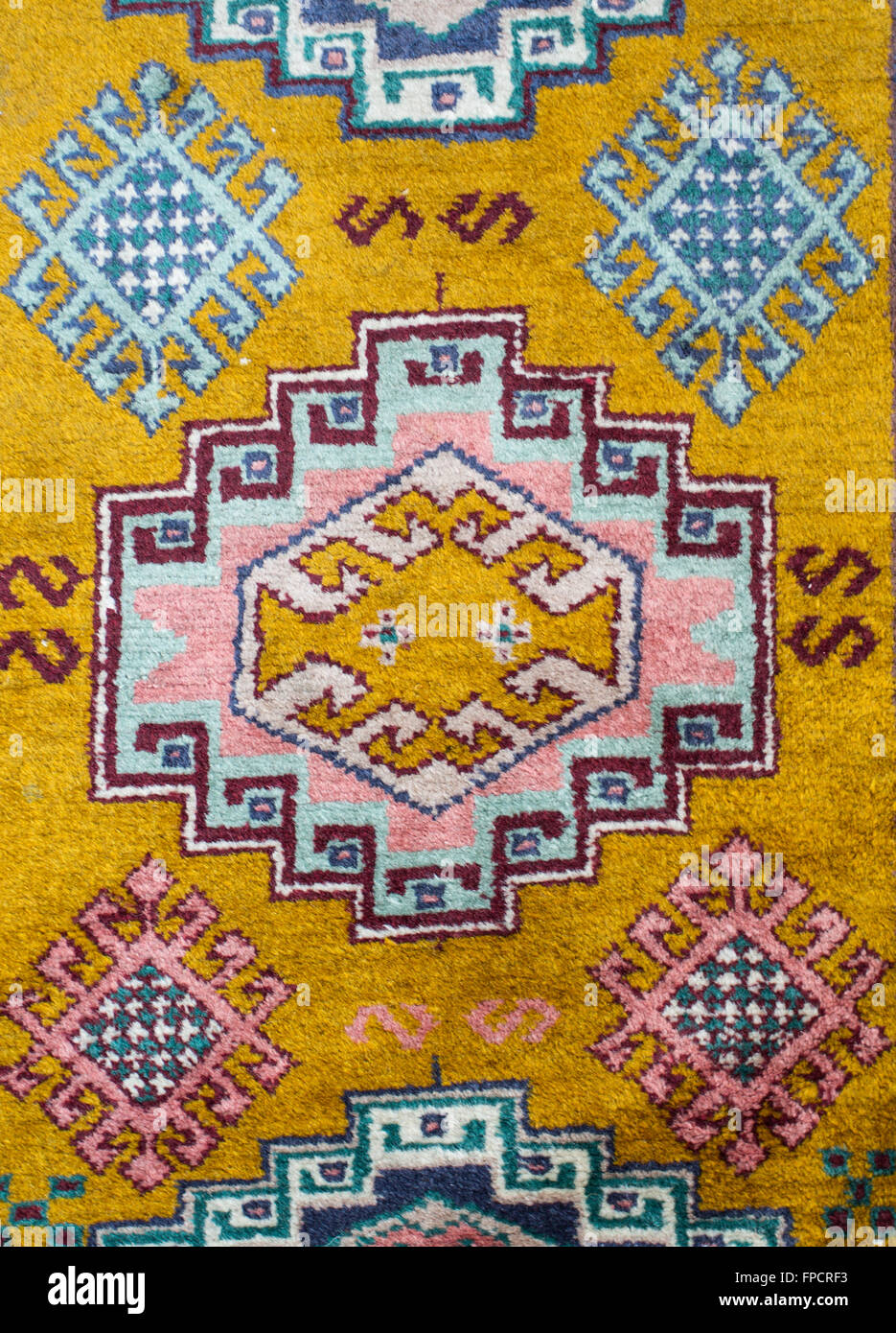 Armenian colorful hand made rug with traditional patterns and ornaments ...
