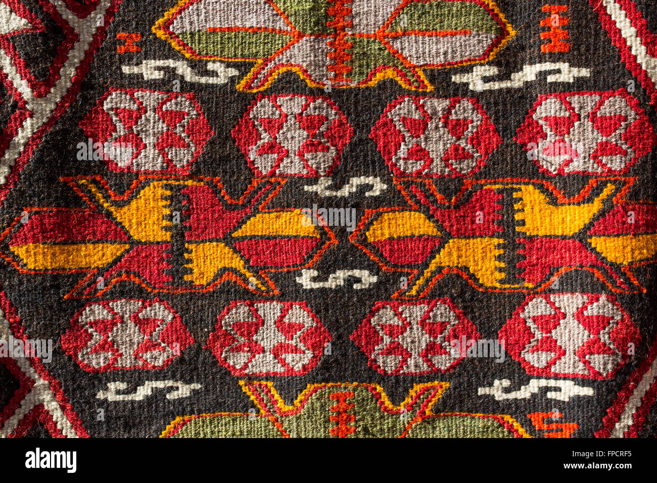 Armenian colorful hand made rug with traditional patterns and ornaments ...