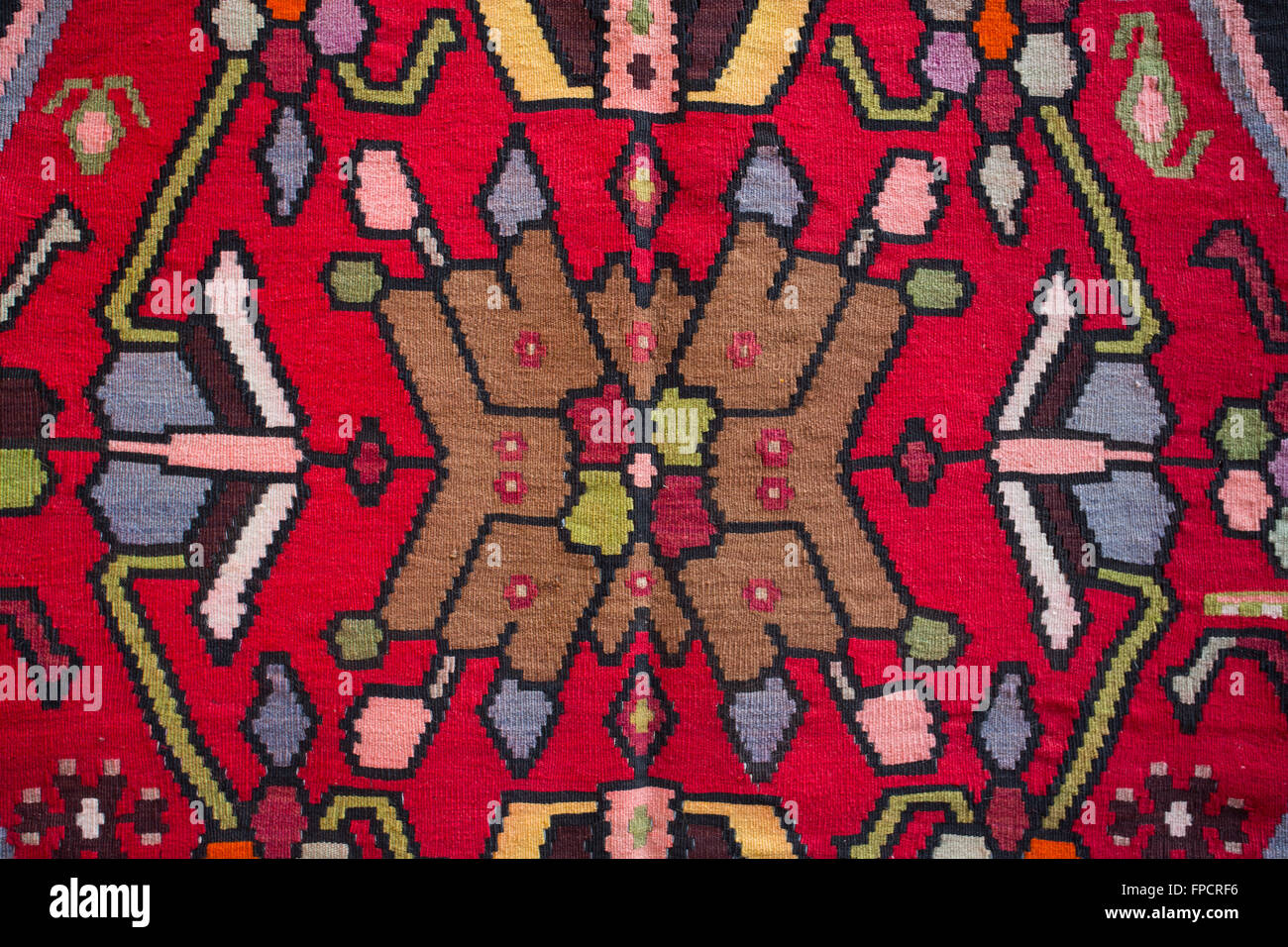 Armenian colorful hand made rug with traditional patterns and ornaments ...