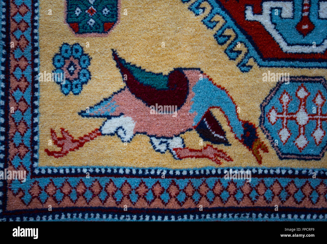 Armenian colorful hand made rug with traditional patterns and ornaments ...