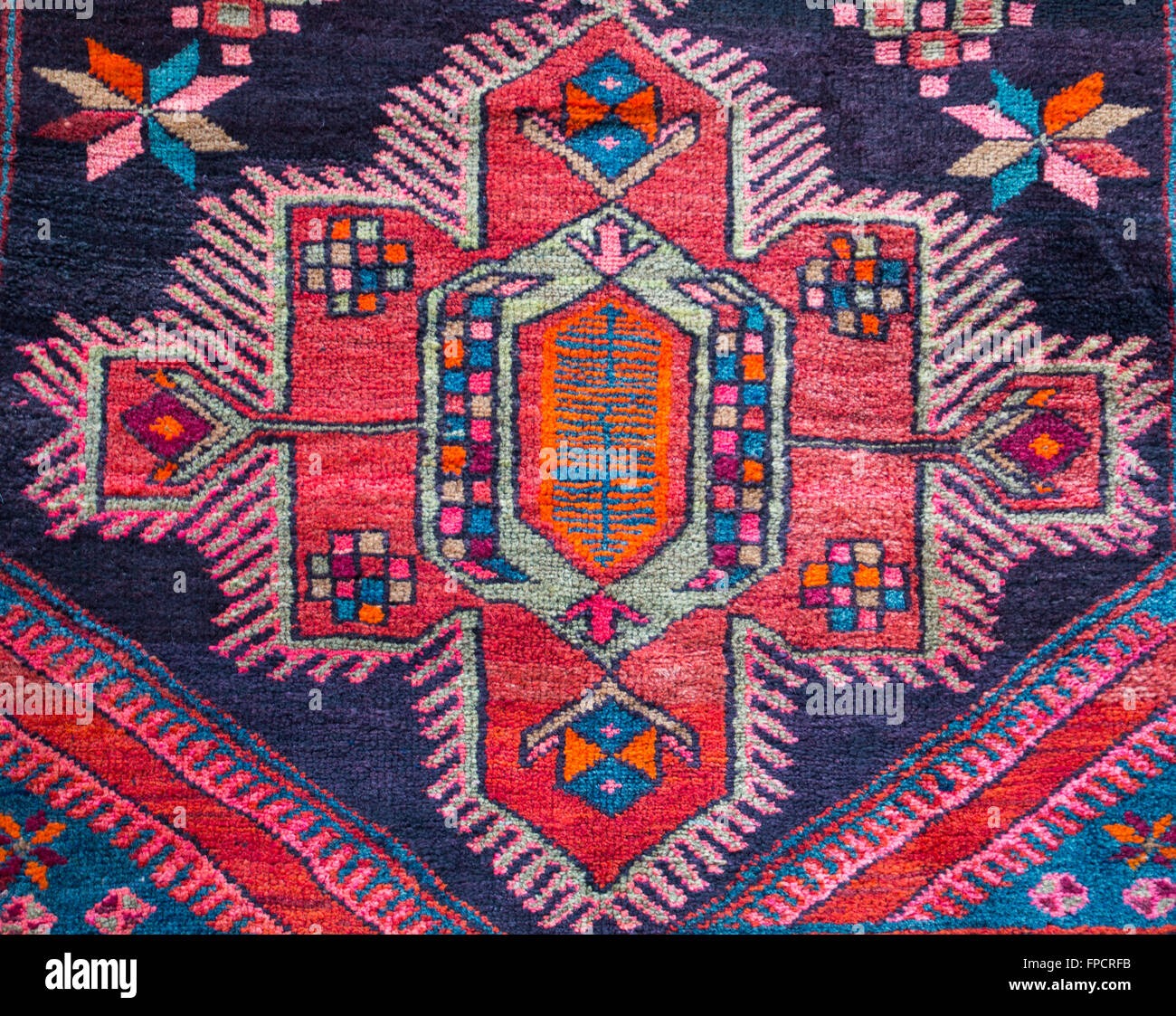 Armenian colorful hand made rug with traditional patterns and ornaments ...
