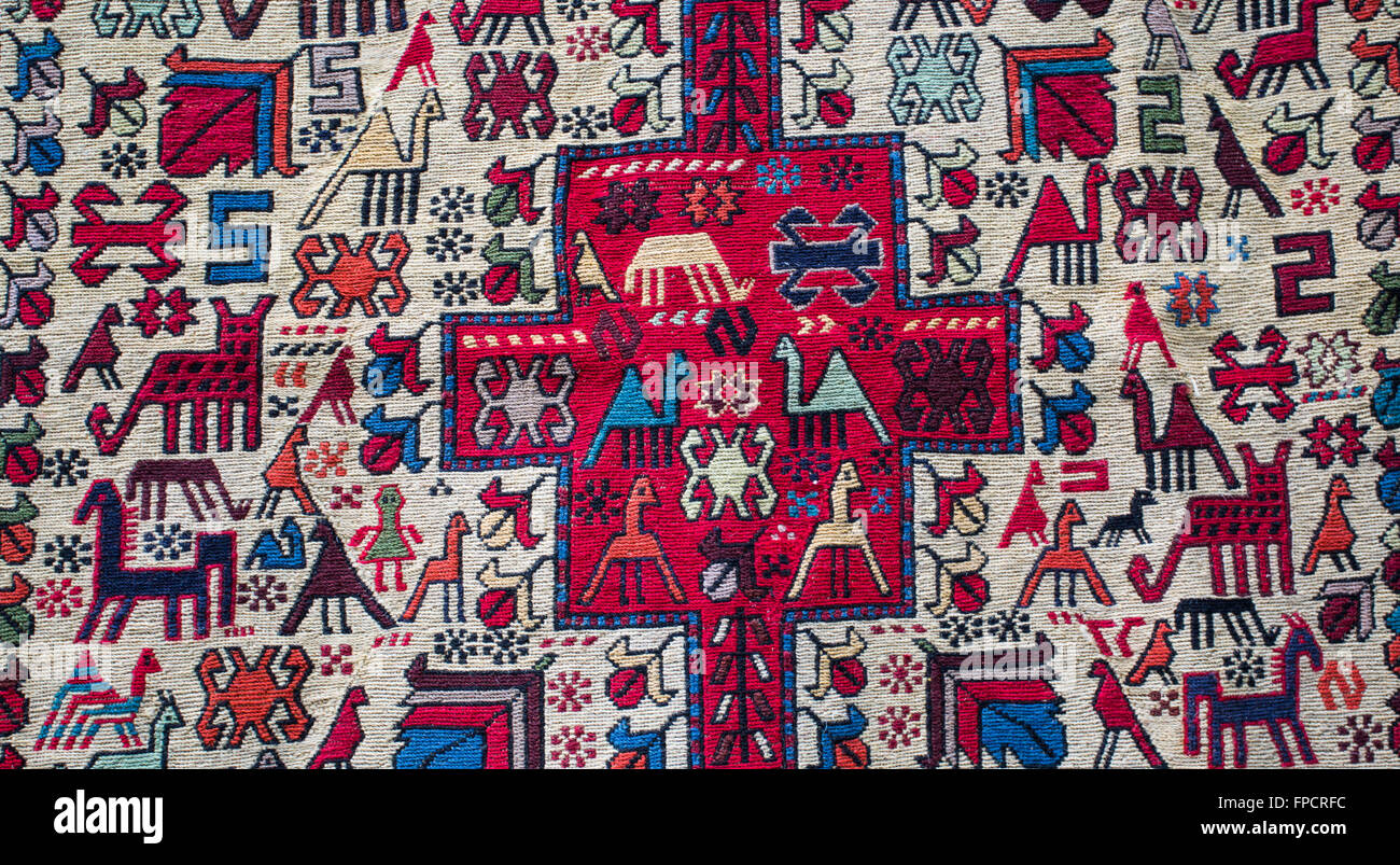 Armenian colorful hand made rug with traditional patterns and ornaments ...