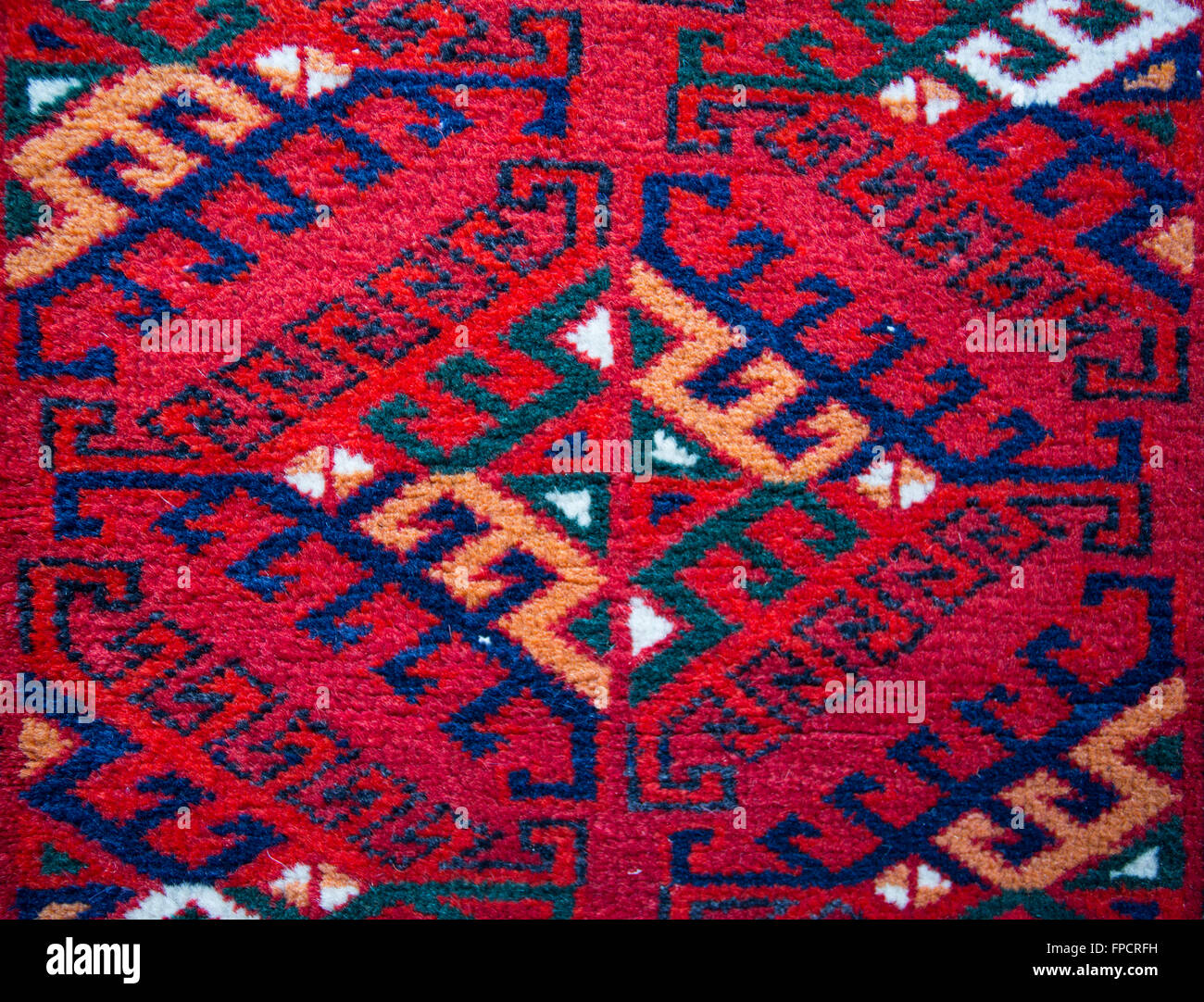 Armenian colorful hand made rug with traditional patterns and ornaments ...