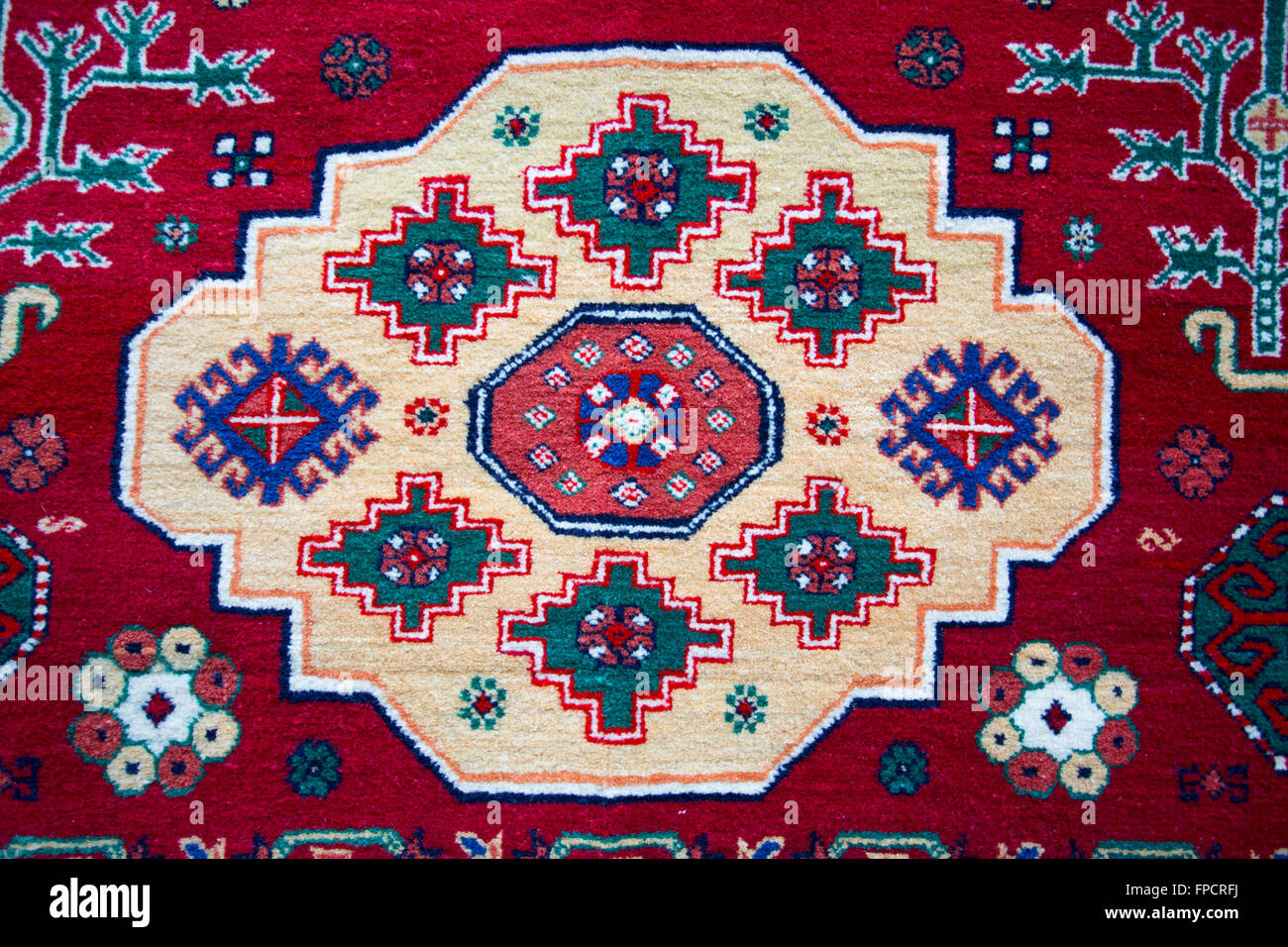 Armenian colorful hand made rug with traditional patterns and ornaments ...
