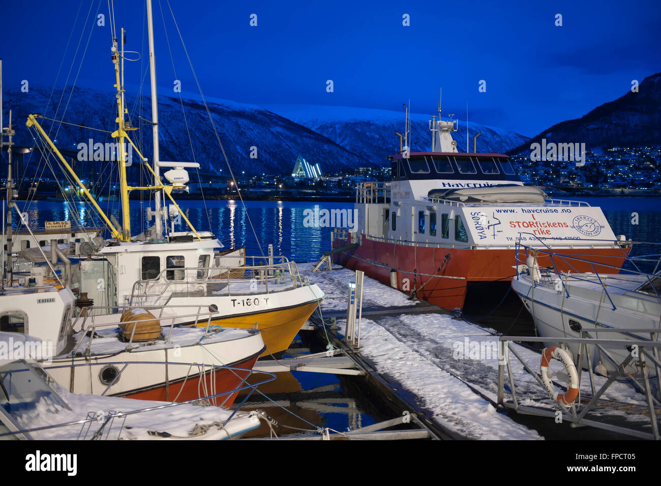 Tromso harbour at night. Norway Stock Photo - Alamy