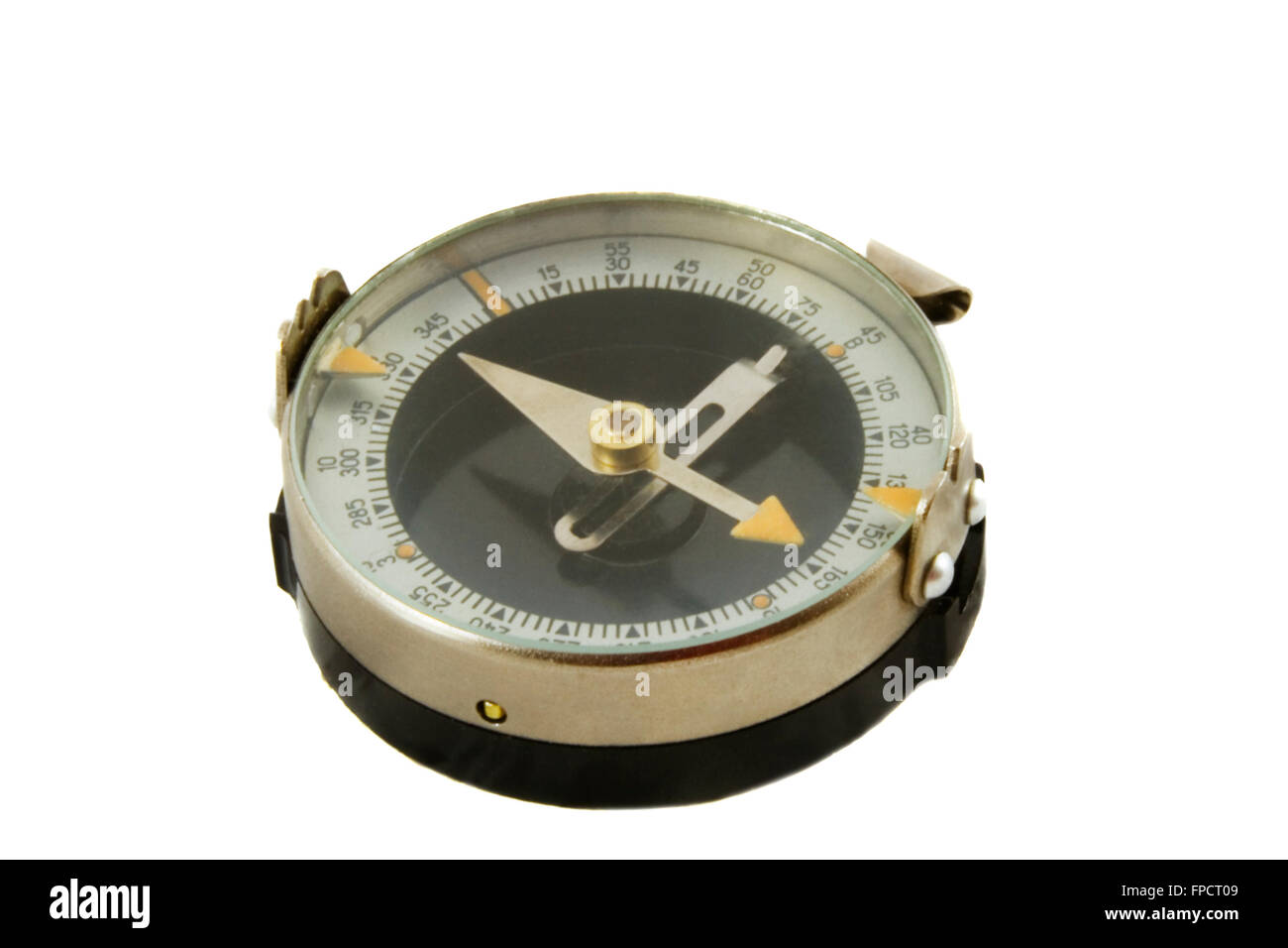 Old style brass compass on white background Stock Photo - Alamy