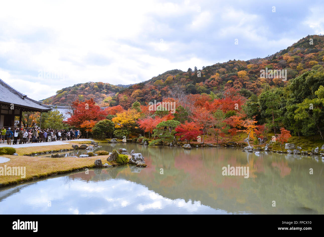 Tourists in Kyoto temple with change color forest in Fall season. Kyoto ...