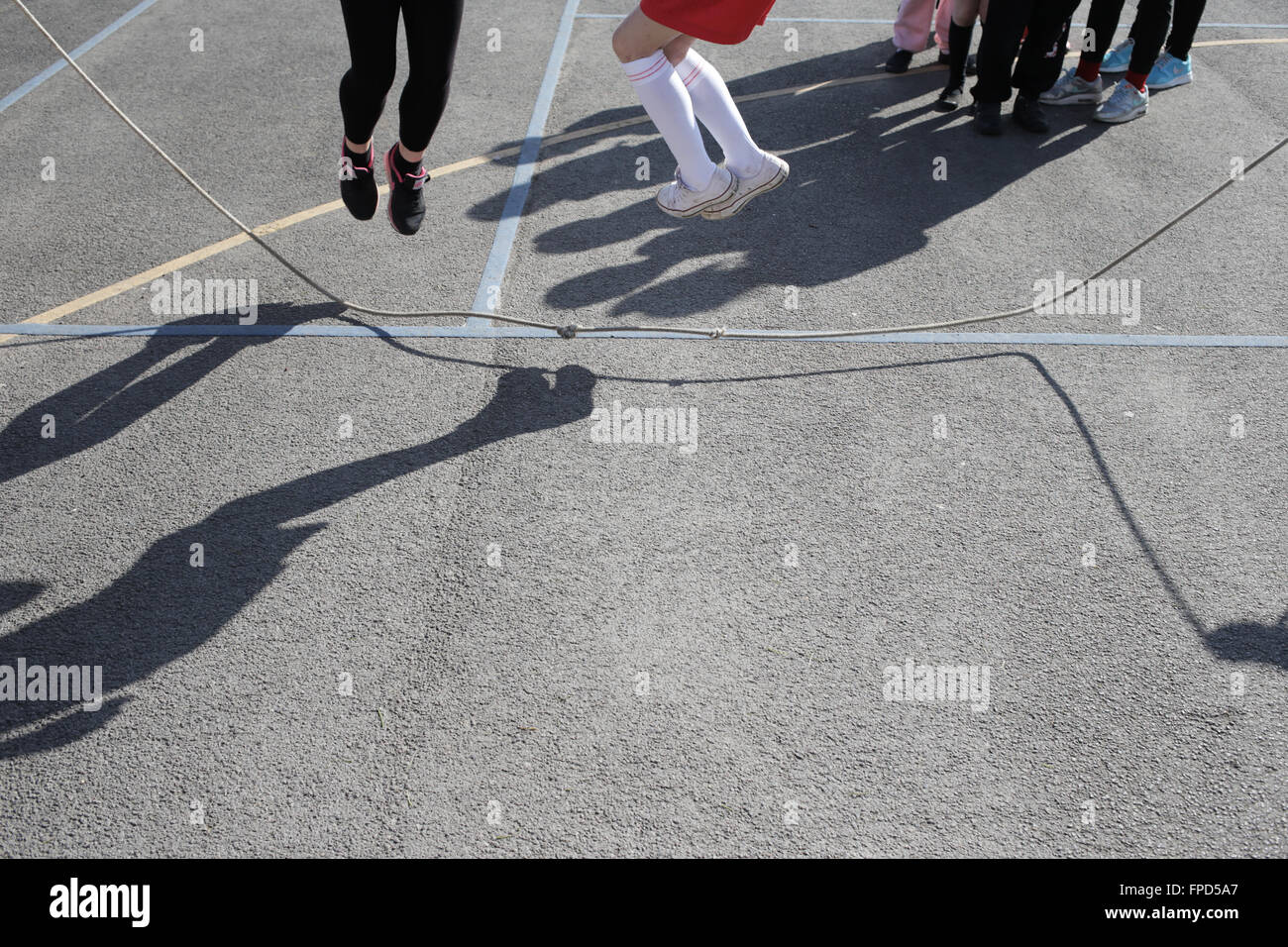 Children skipping rope hi-res stock photography and images - Alamy