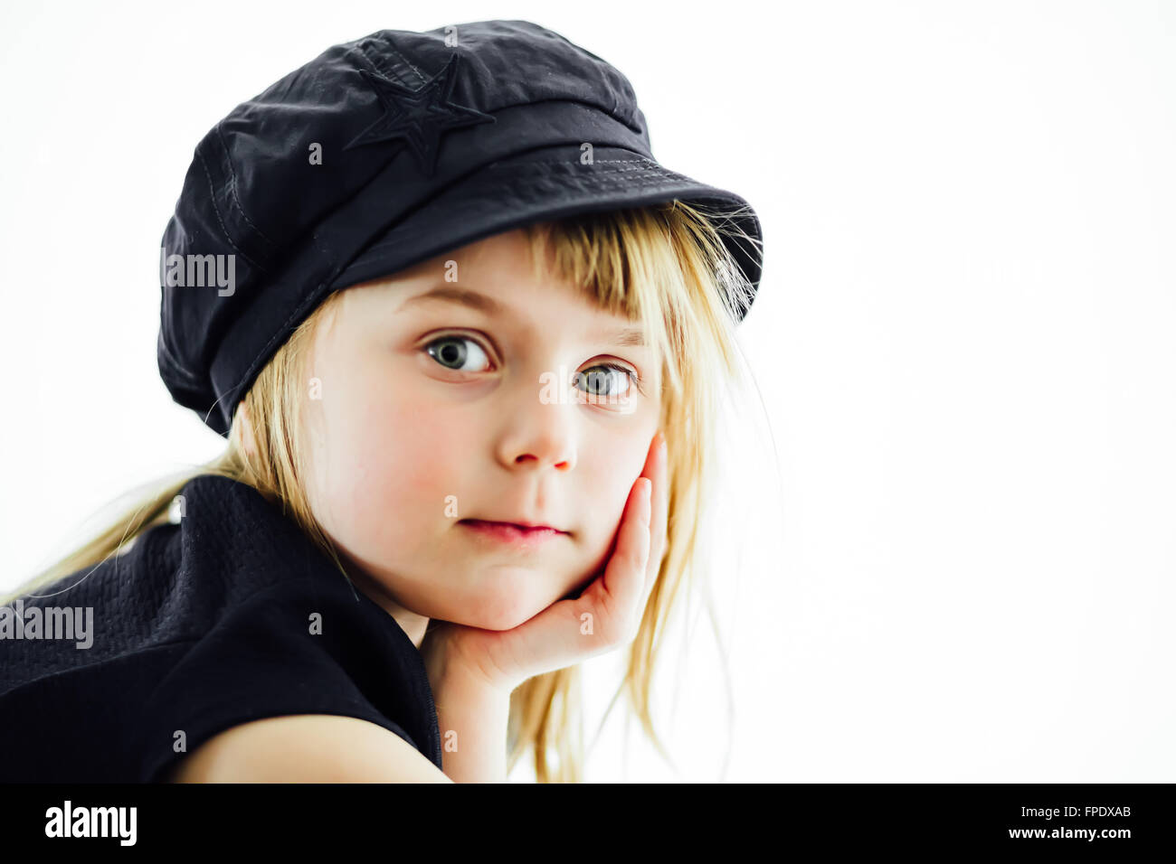 Little girl in cap hi-res stock photography and images - Alamy
