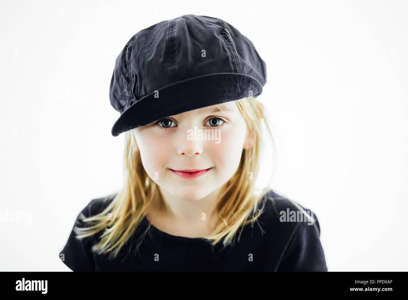 Little girl in cap hi-res stock photography and images - Alamy