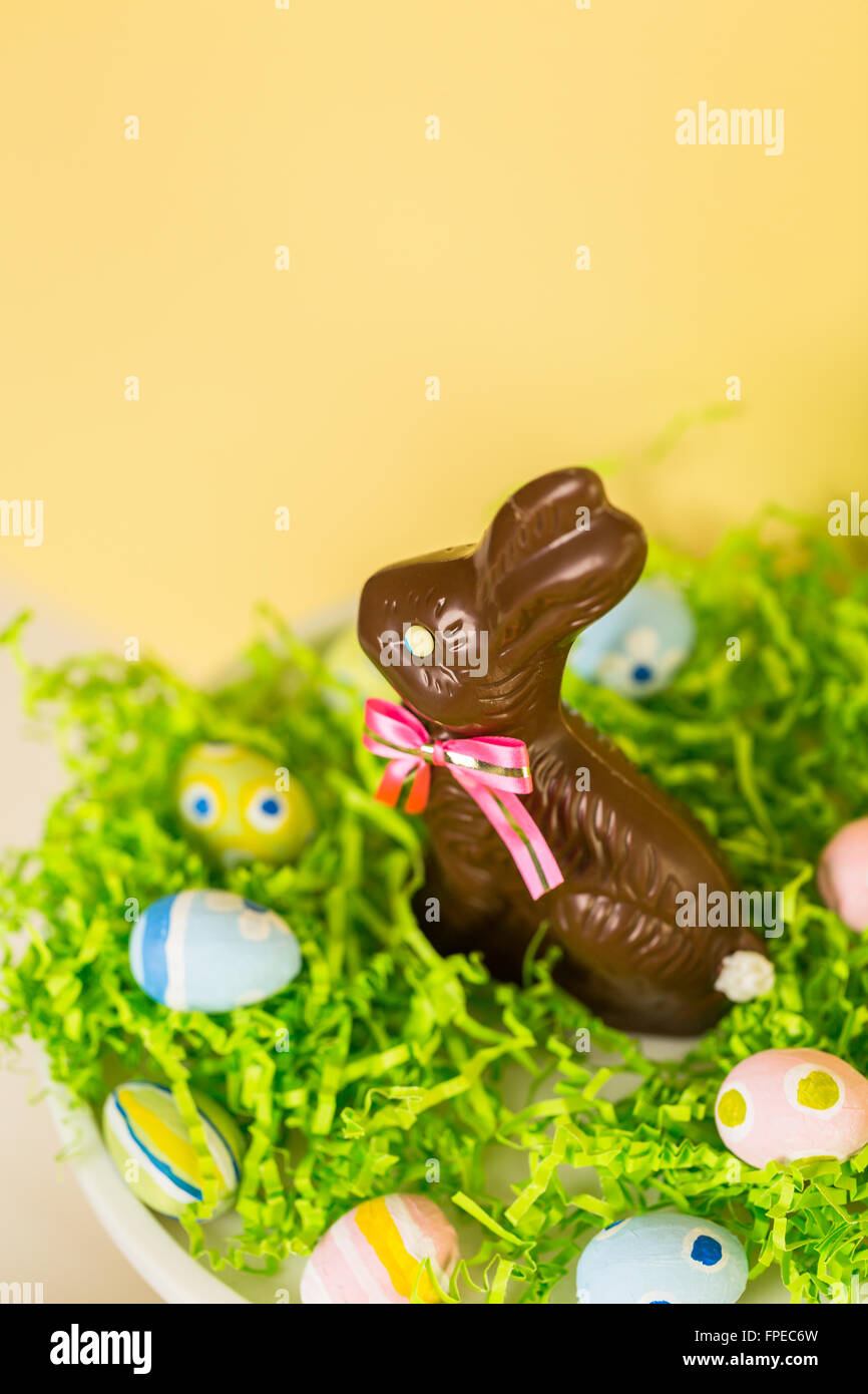 Chocolate bunny on decorated cake stand for Easter brunch Stock Photo ...