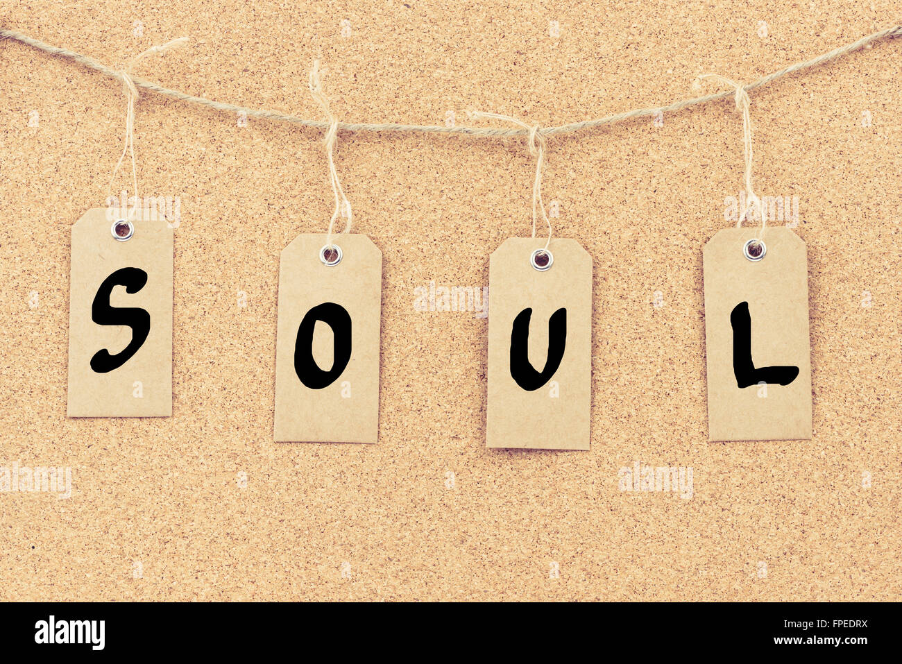 Vintage grunge tags with letters on rope string, word SOUL over cork ...