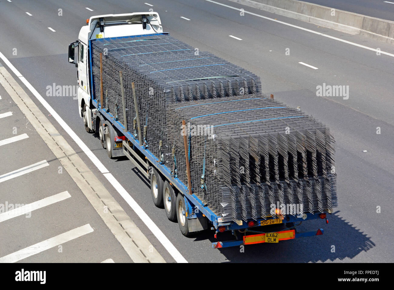 Transport logistics via hgv lorry truck load of building steel ...