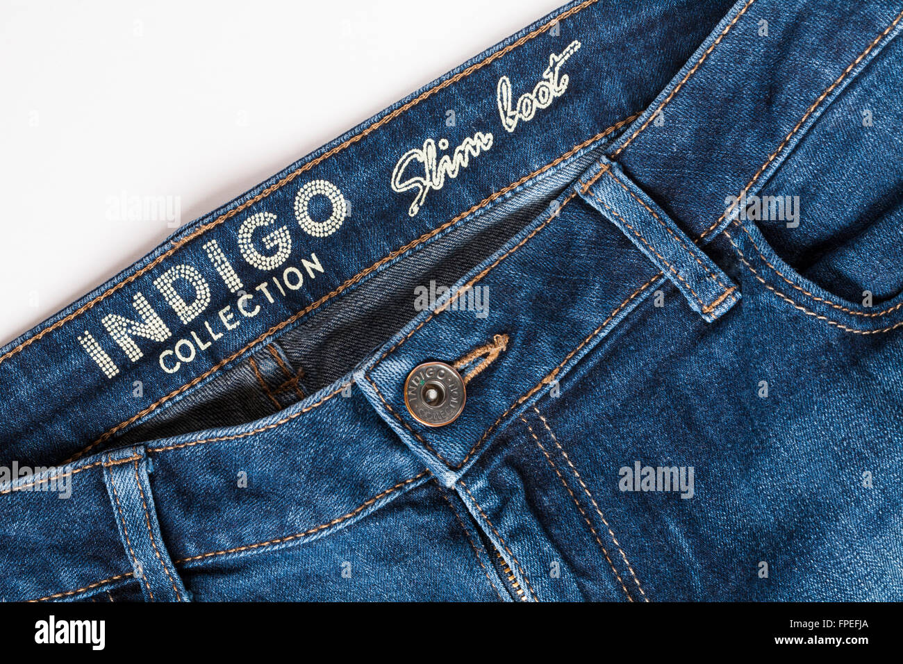 Indigo collection slim boot stamped in denim jeans Stock Photo - Alamy