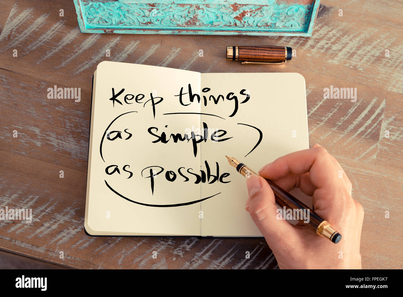 Handwritten text KEEP THINGS AS SIMPLE AS POSSIBLE, business success ...