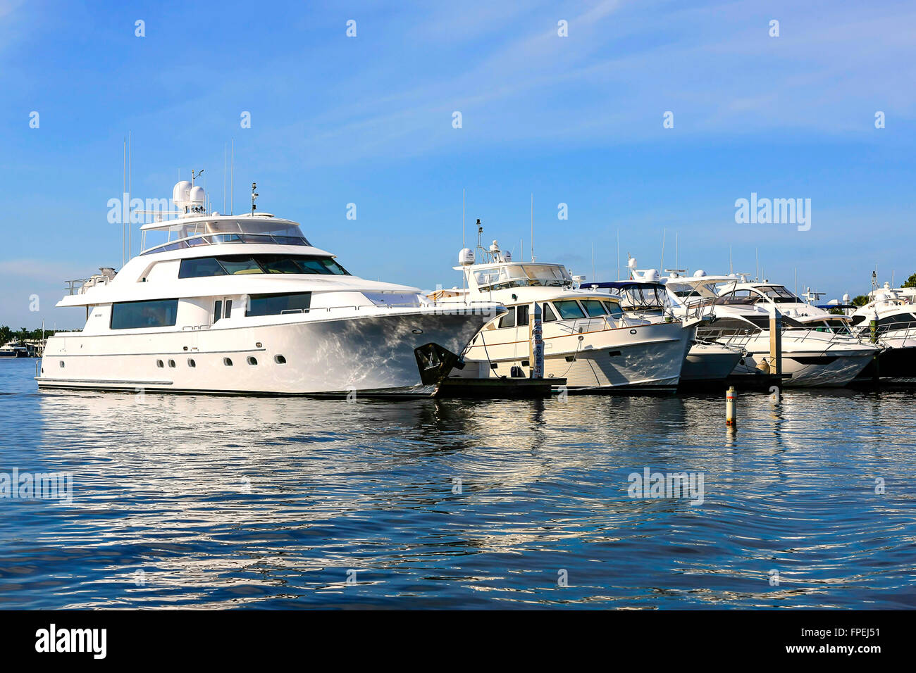 Large boats tied up at the Port of Naples Marina in Florida Stock Photo ...