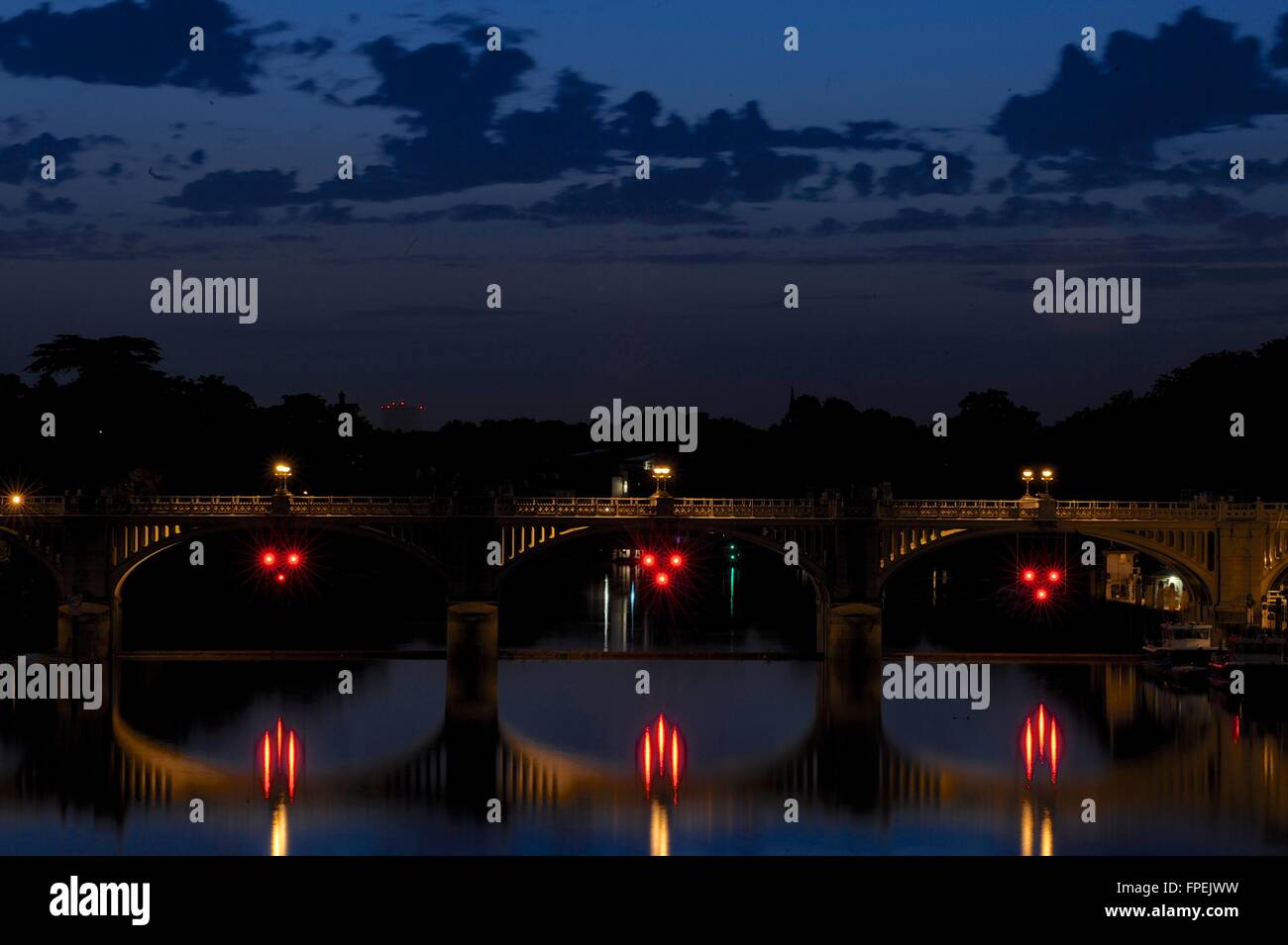 Bridge over a river at night Stock Photo - Alamy