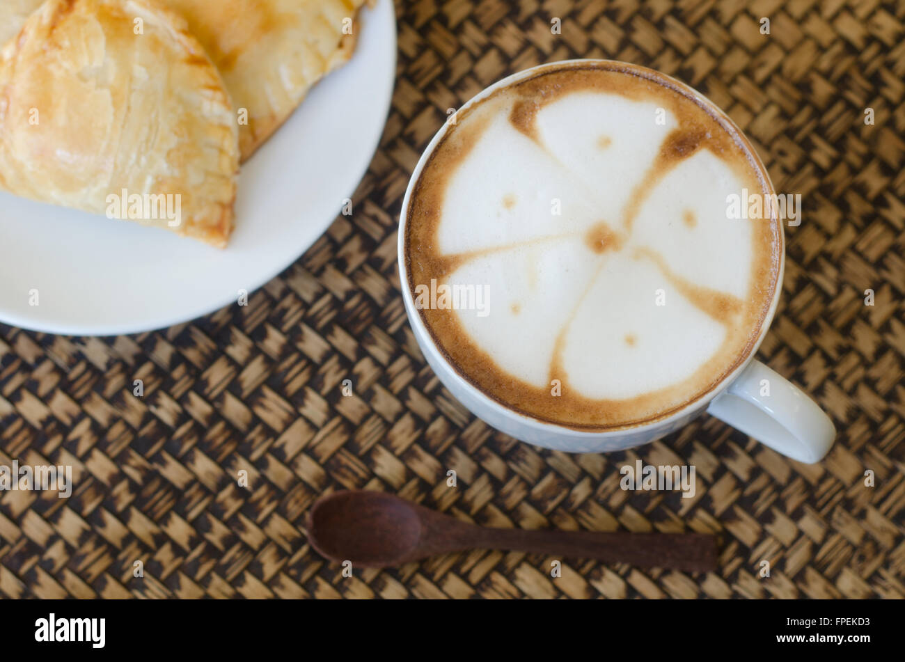 A cup of hot coffee and curry puff Stock Photo - Alamy