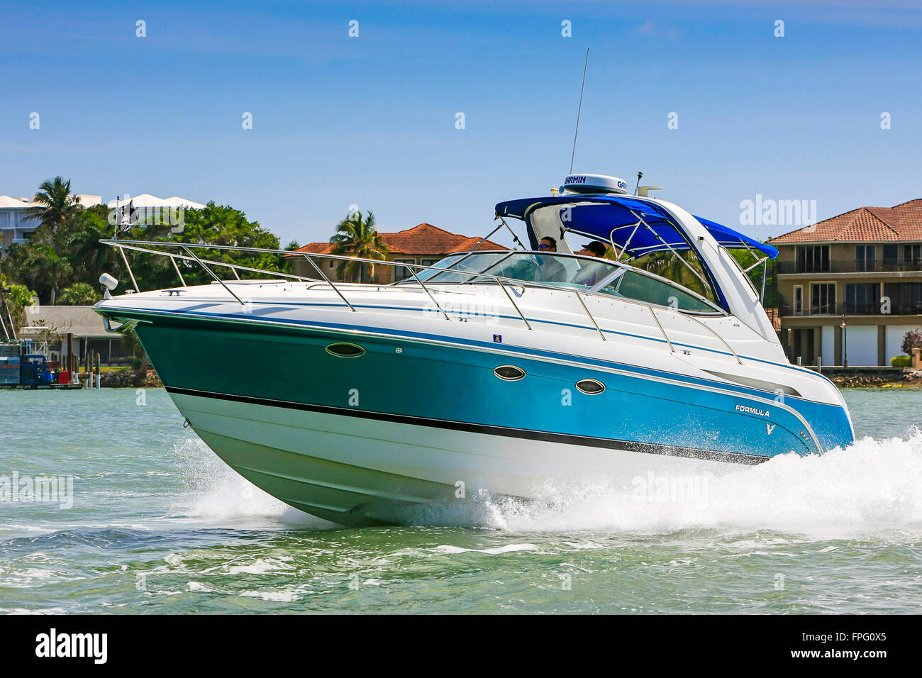 Formula Performance Cruiser34 speedboat heading out into the Gulf of ...