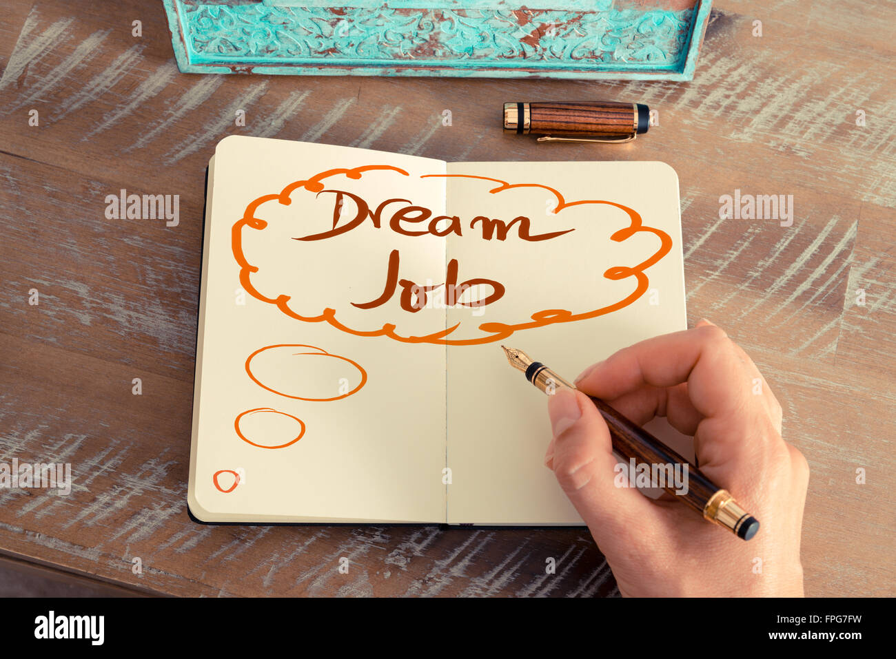 Handwritten text DREAM JOB in drawing bubble, business success concept ...