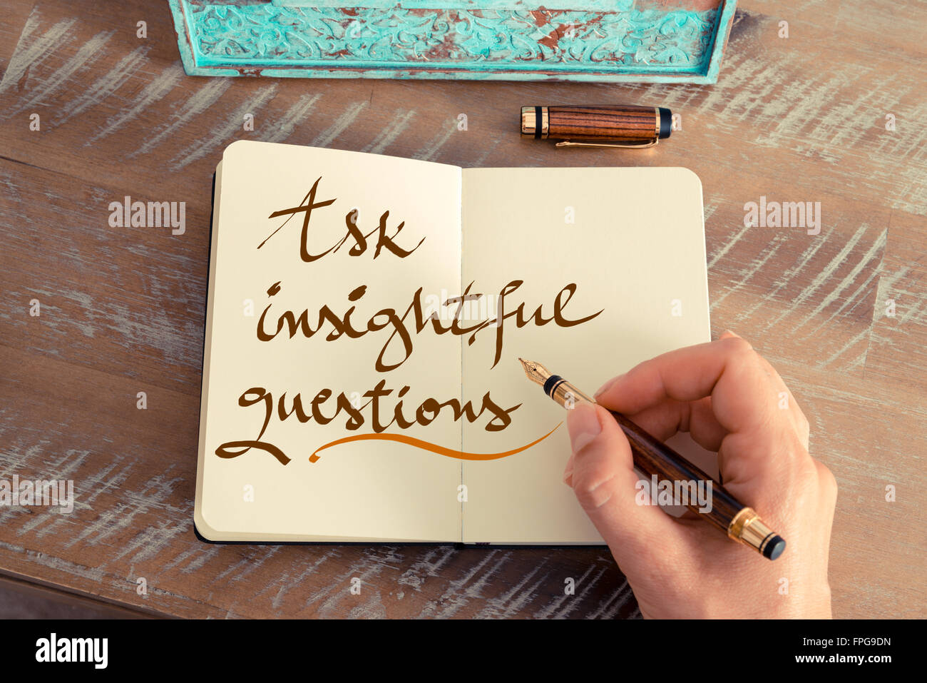 Handwritten text ASK INSIGHTFUL QUESTIONS, business success concept ...