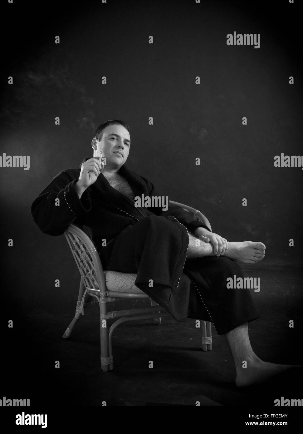 Smoking man in dressing gown hi-res stock photography and images - Alamy