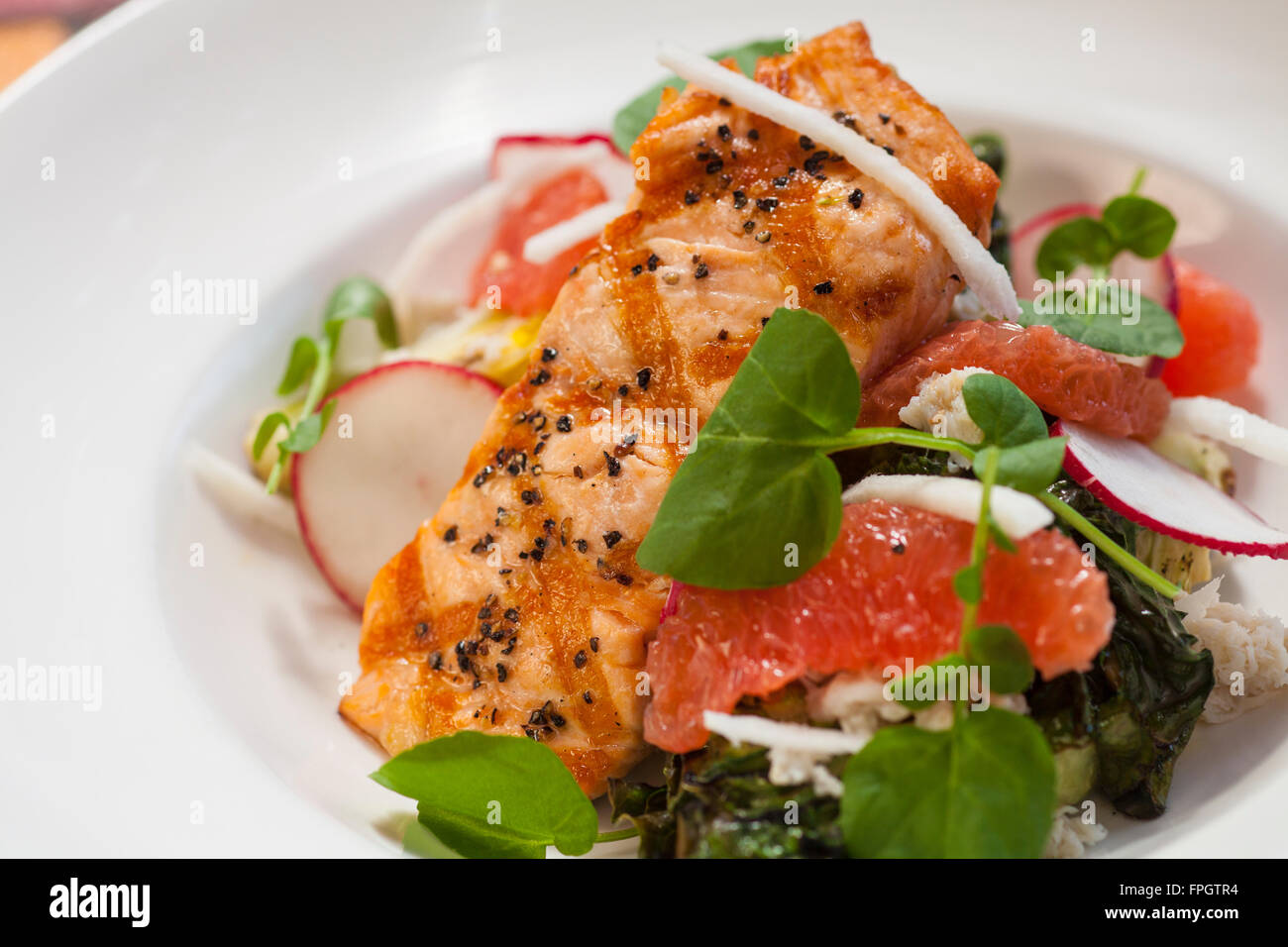 grilled salmon with ruby red grapefruit slices, crab, jicama and ...