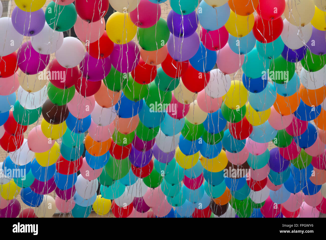 Multi colored balloons hi-res stock photography and images - Alamy