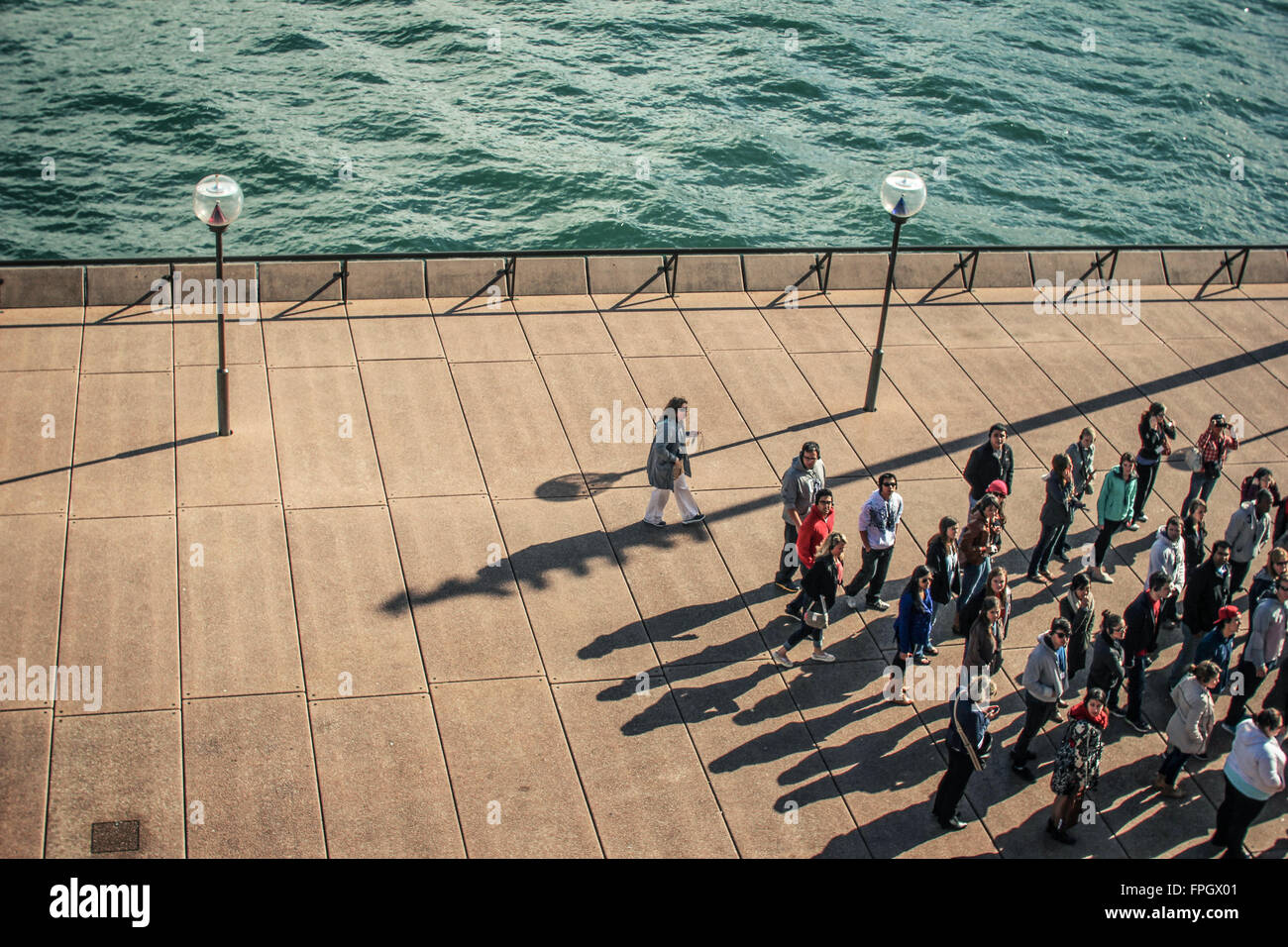 people waiting in front of opera house in sydney Stock Photo - Alamy