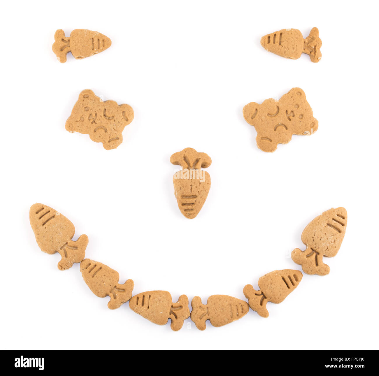 smile figure made of ginger snaps Stock Photo - Alamy