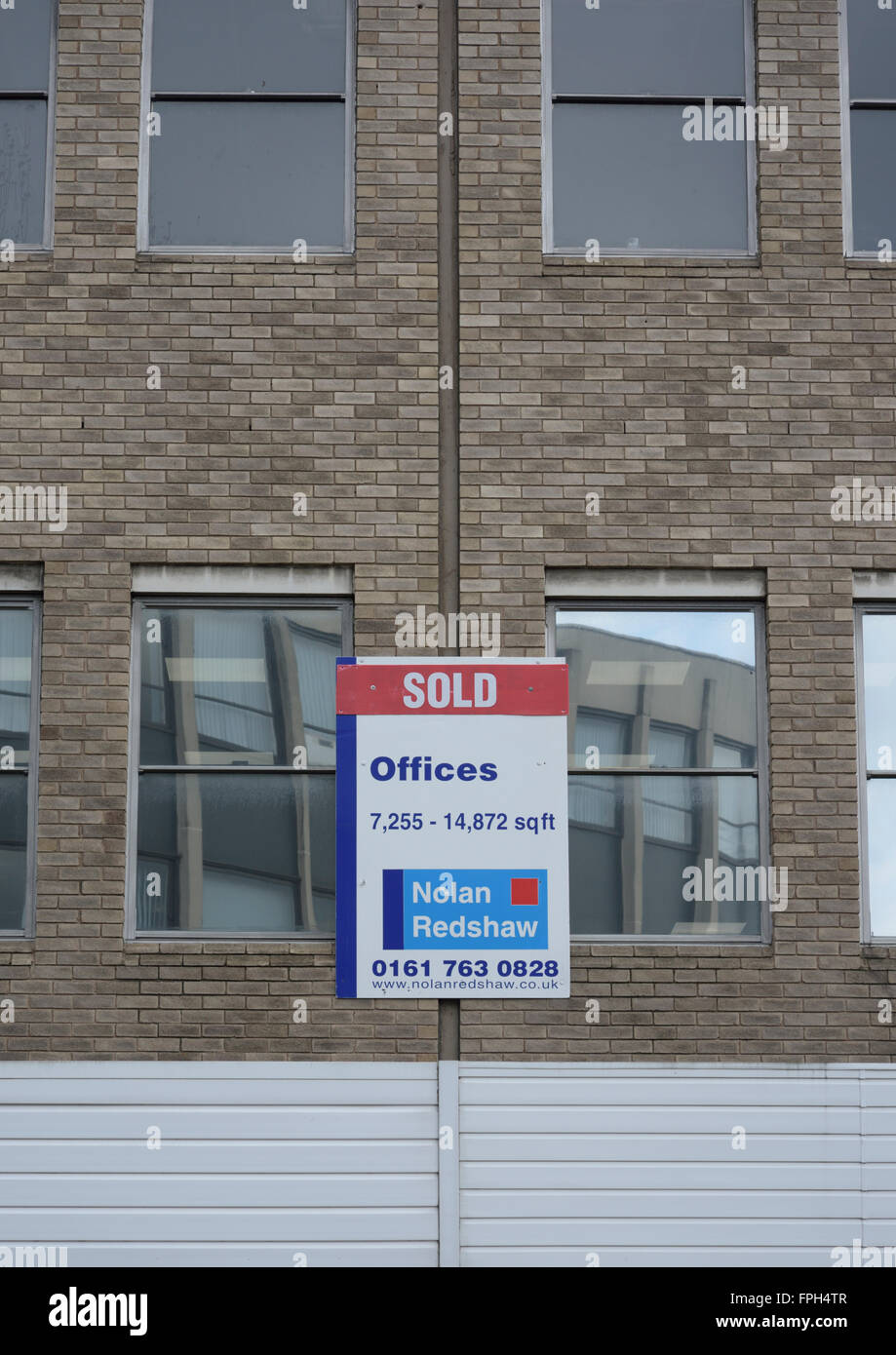 Sold sign outside commercial property in bury lancashire uk Stock Photo ...