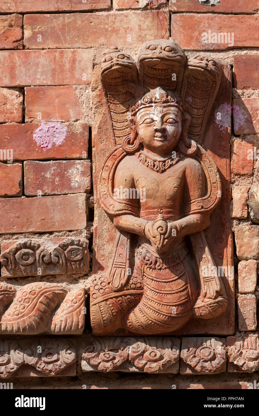 Nepal, Patan. Decorative Stone Carving on House Wall Stock Photo - Alamy