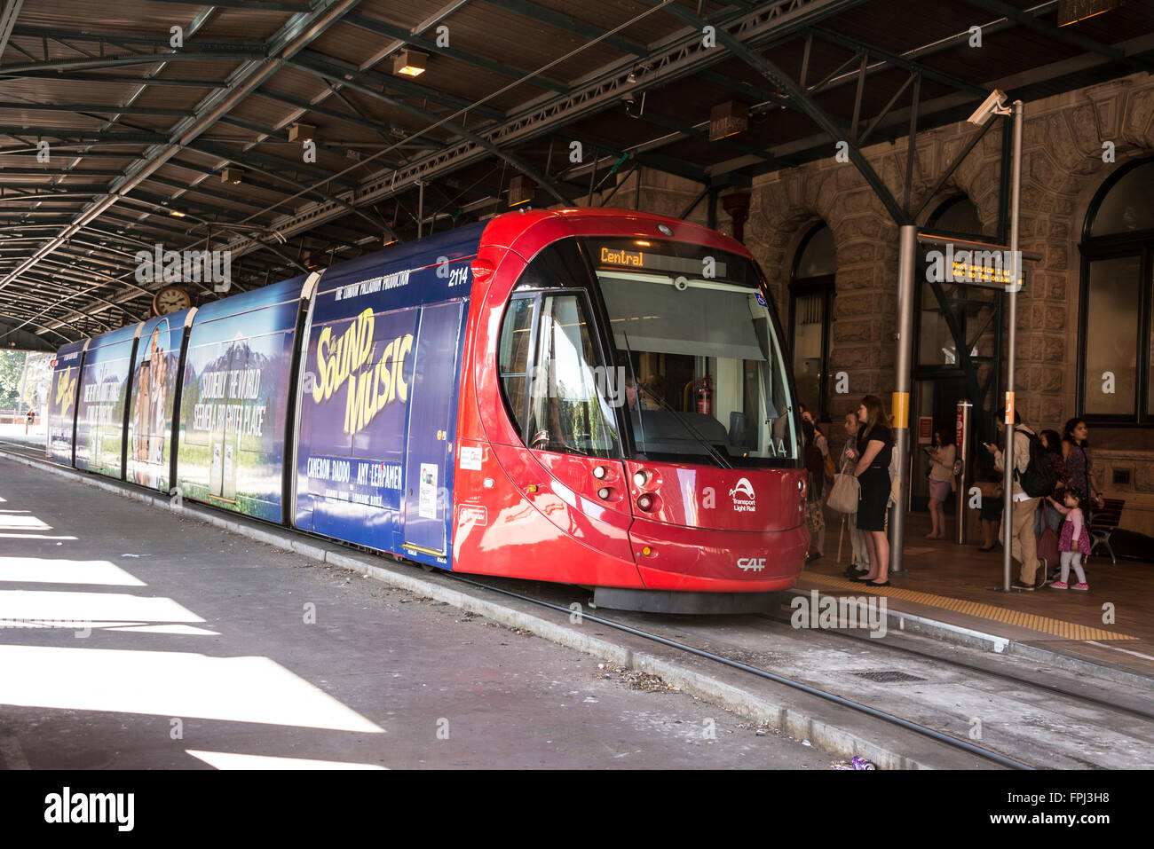 A Sydney light rail tram manufactured by the Spanish CAF group, stops ...