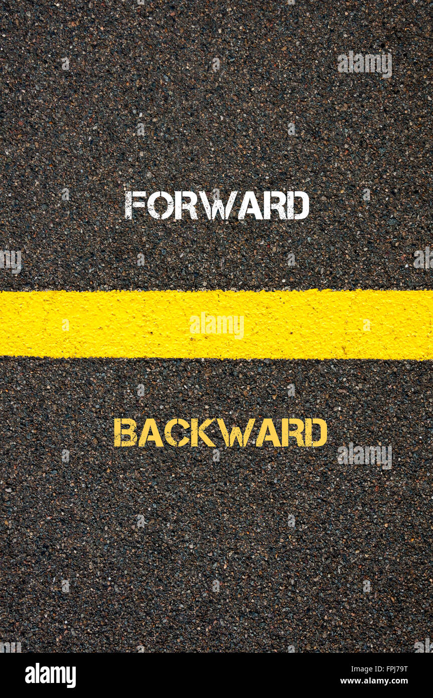 Antonym concept of FORWARD versus BACKWARD written over tarmac, road ...