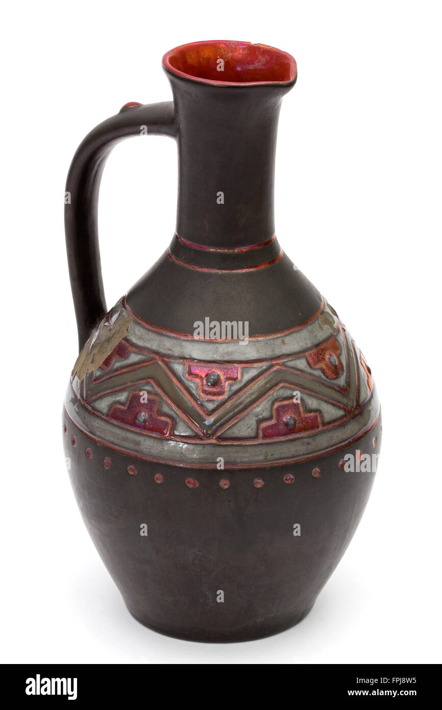 Old pitcher, isolated on white background Stock Photo - Alamy