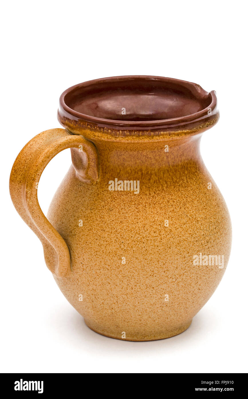 Old pitcher, isolated on white background Stock Photo - Alamy