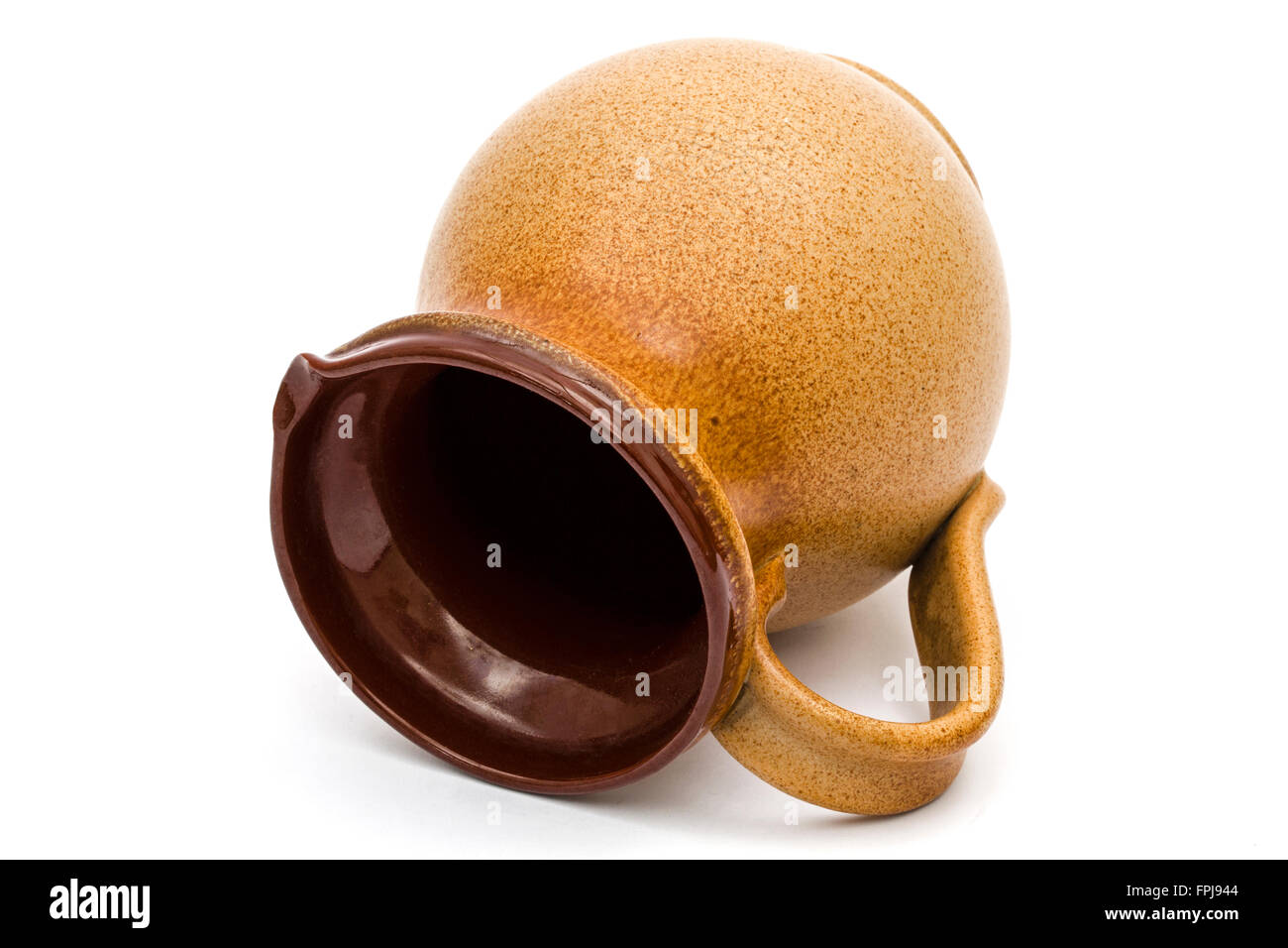 Old pitcher, isolated on white background Stock Photo - Alamy