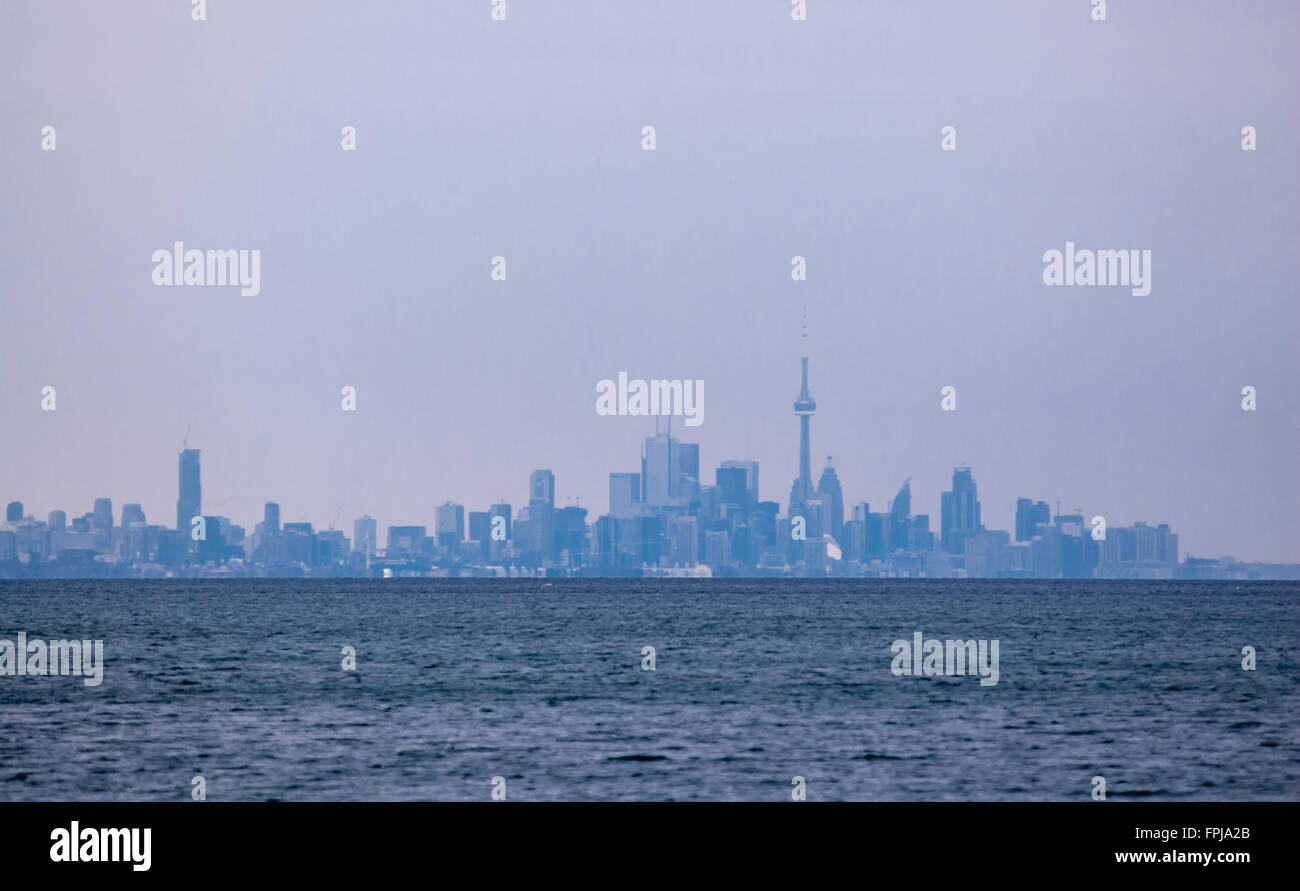 Hazy skyline of Toronto, Ontario, Canada, from across water Stock Photo ...