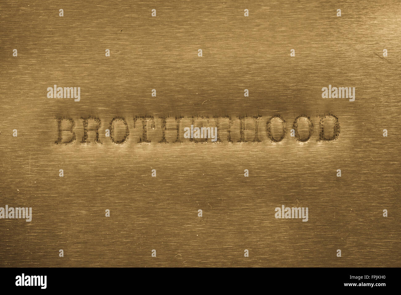 word brotherhood printed on golden metallic background Stock Photo - Alamy