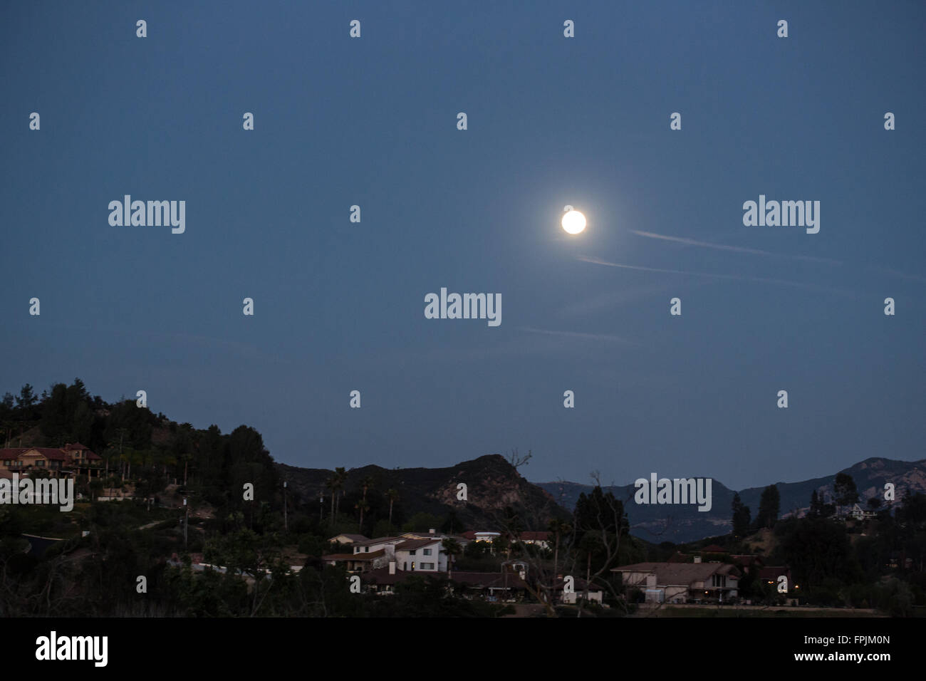 Moon over rooftop hi-res stock photography and images - Alamy