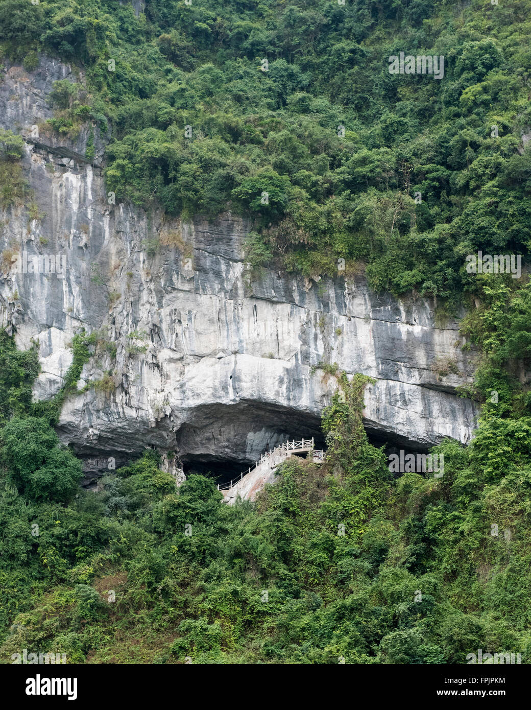 Outside view of Han Sung Sot cave entered high up through a gash in the ...