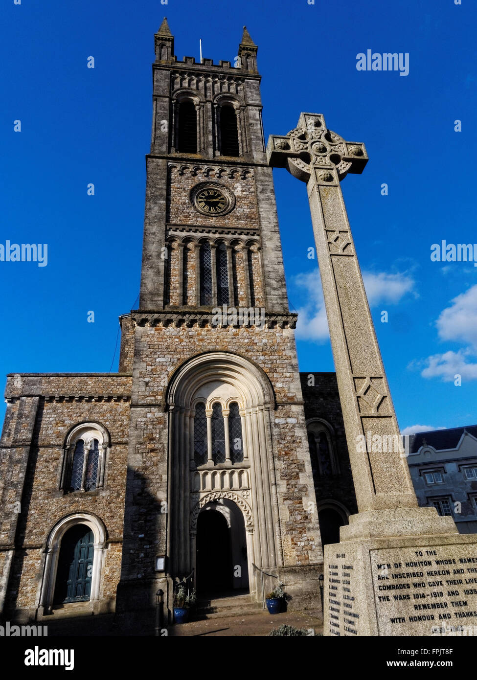 The memorial stands outside St Paul's church in Honiton, Devon, UK ...