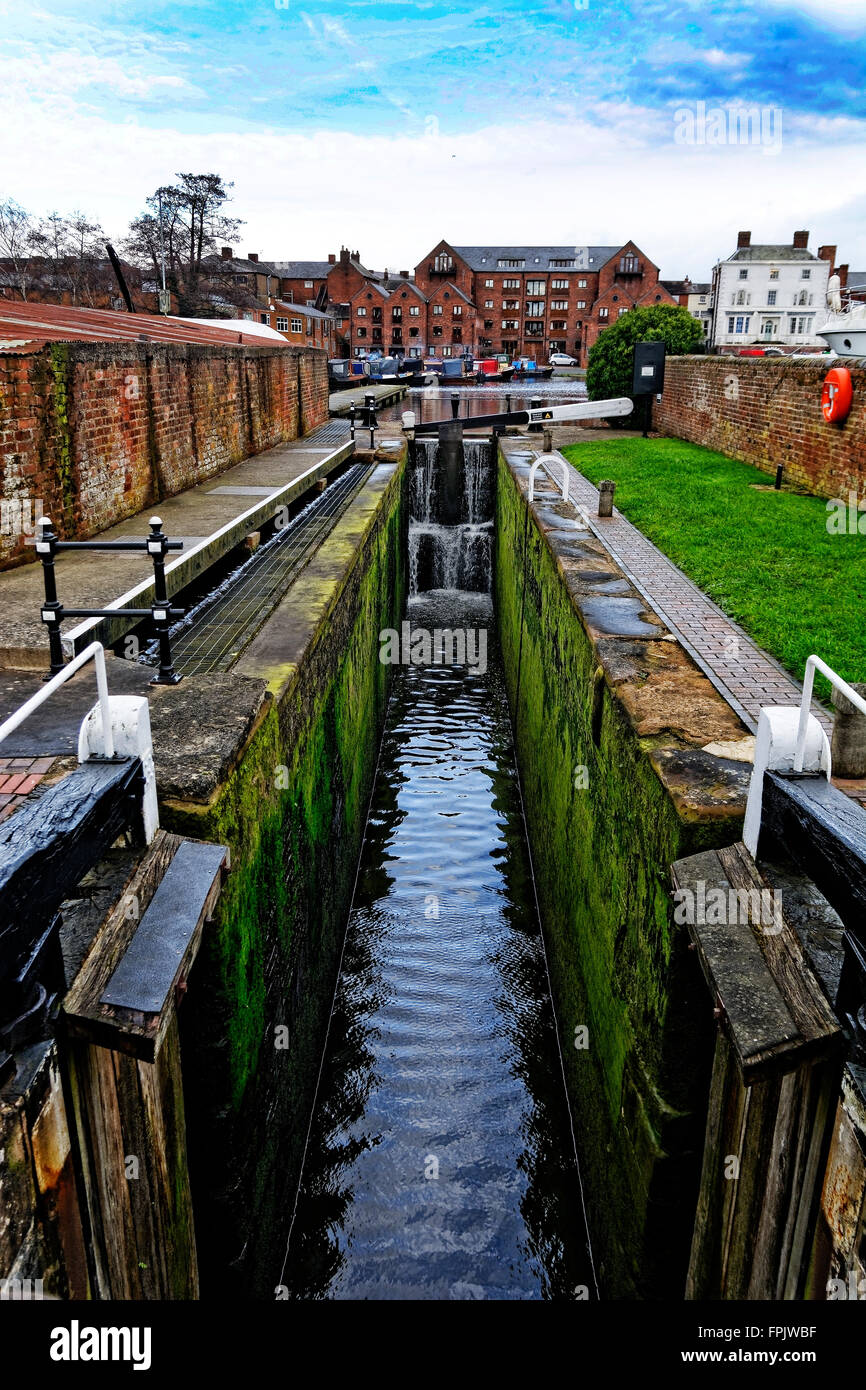 Water cascades through a half open lock gate linking the River Severn ...